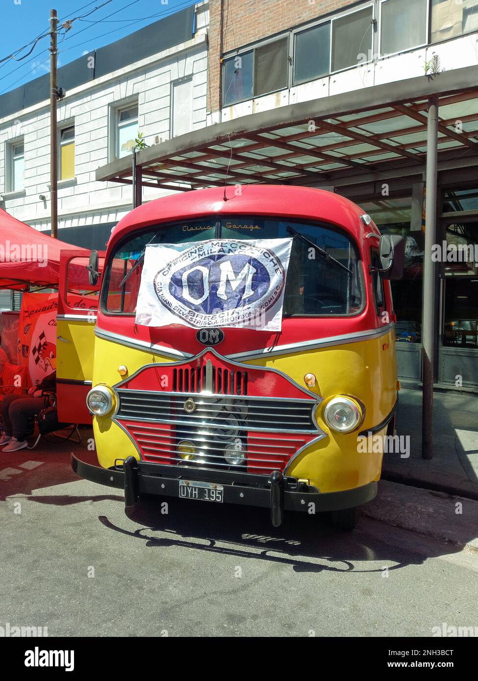 Old OM Officine Mechanique mini bus in the street. Expo Warnes 2022 ...