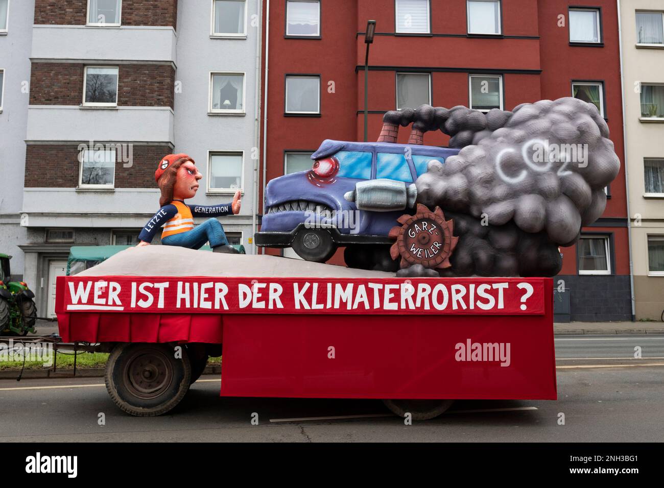 20 February 2023, Düsseldorf, Germany. Politically themed floats ...