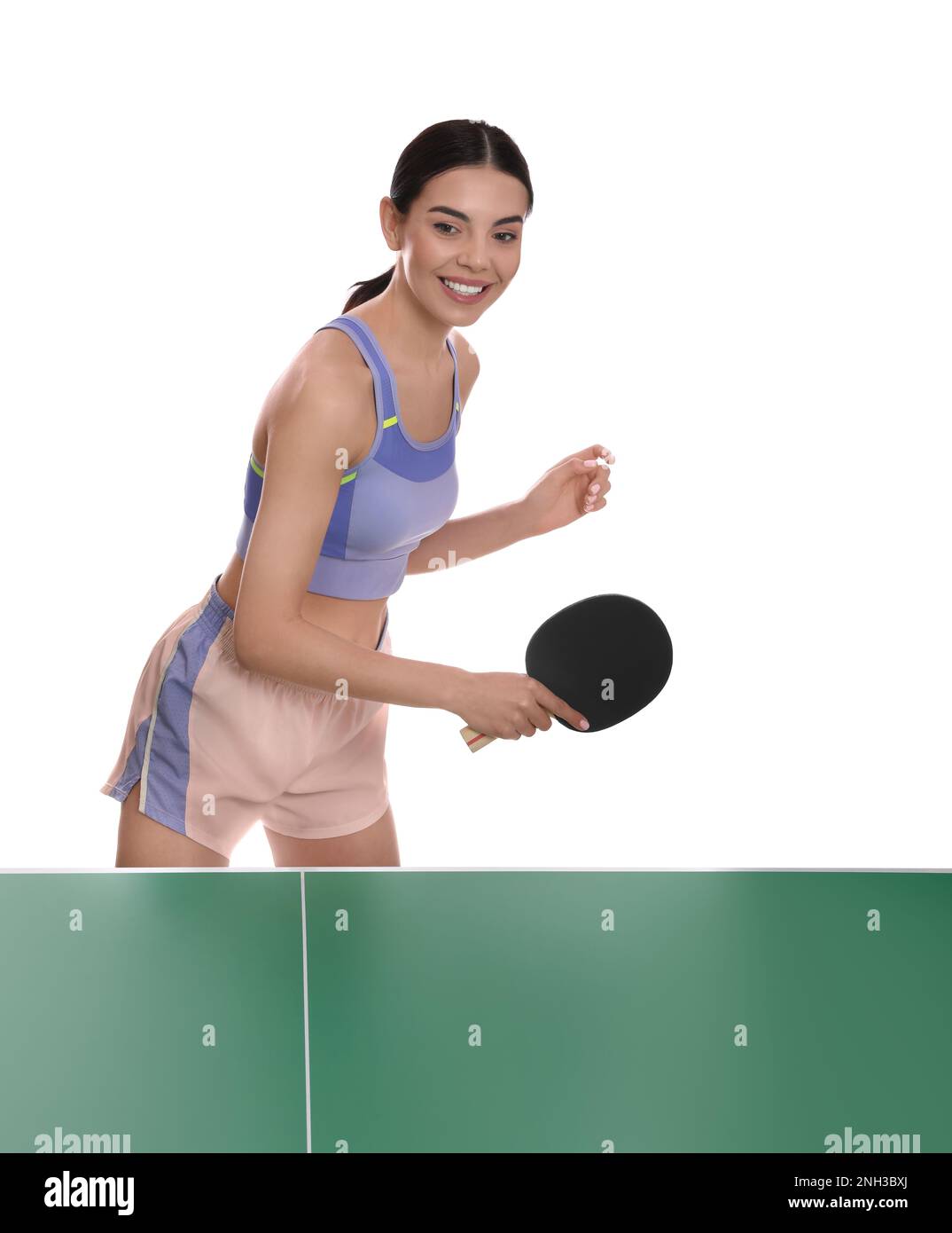Beautiful young woman playing ping pong on white background Stock Photo ...