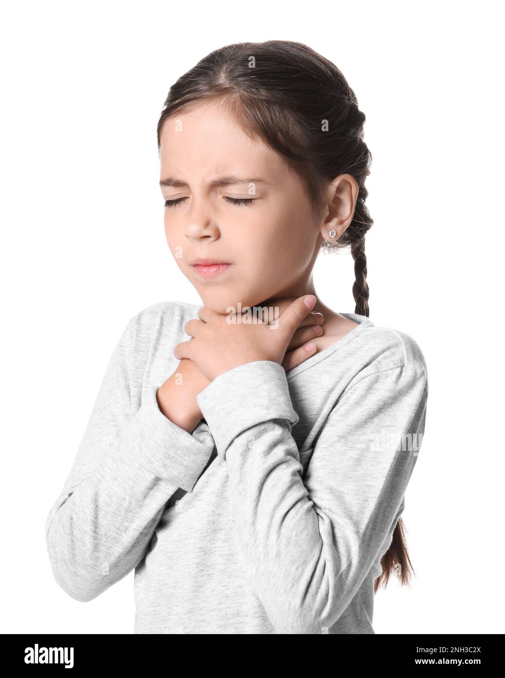 Little girl suffering from sore throat on white background Stock Photo ...