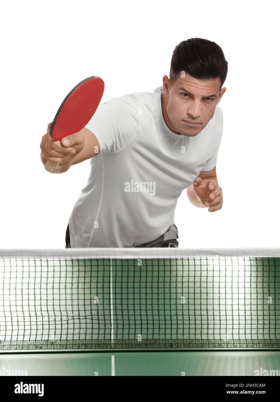 Handsome man playing ping pong on white background Stock Photo - Alamy