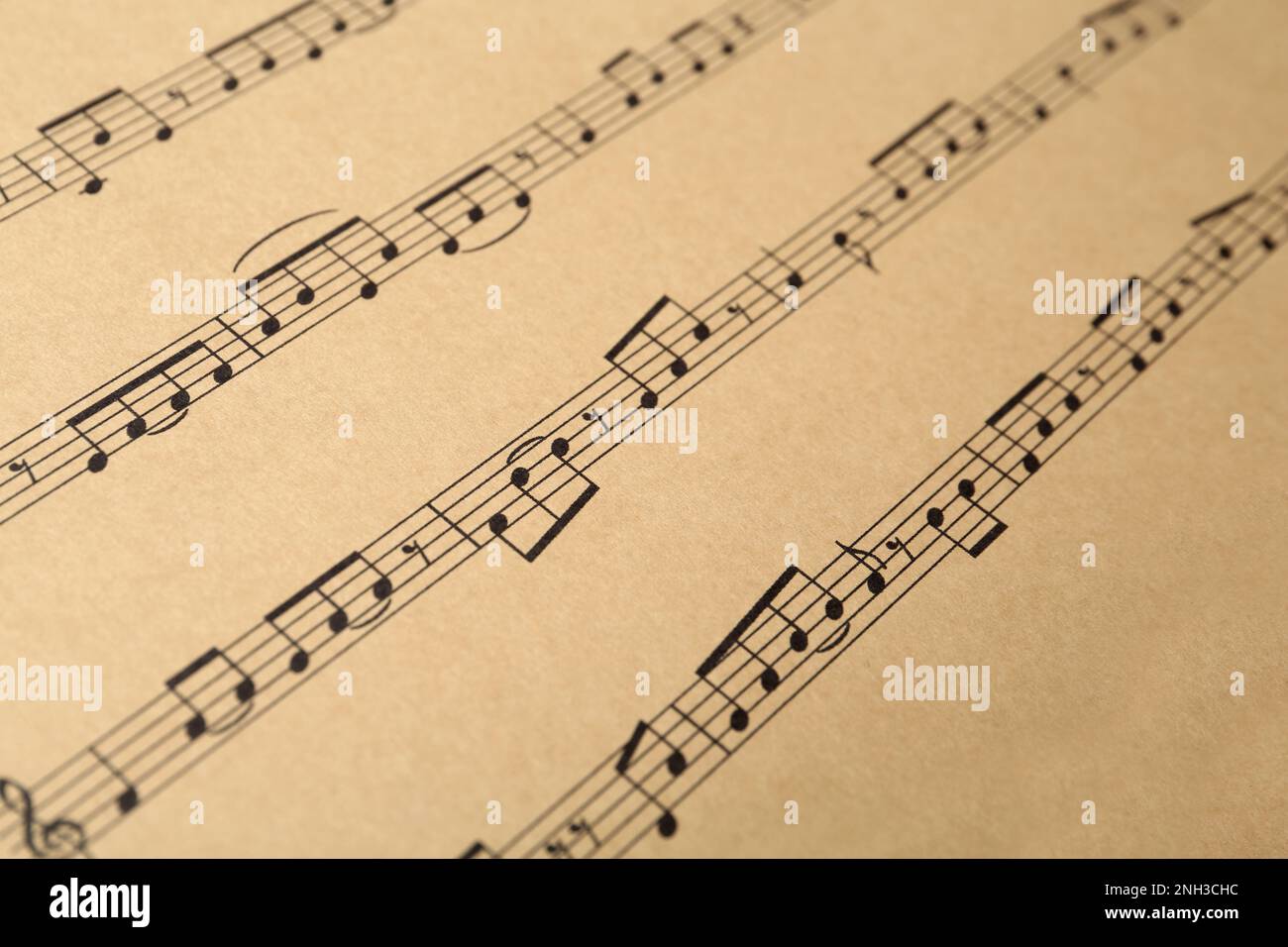 Paper sheet with musical notes, closeup view Stock Photo - Alamy