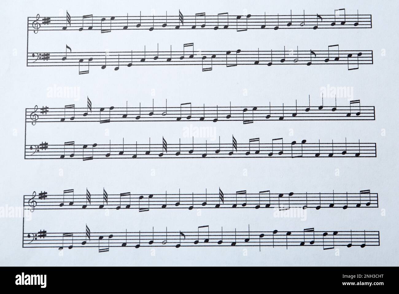 Paper sheet with musical notes, closeup view Stock Photo - Alamy