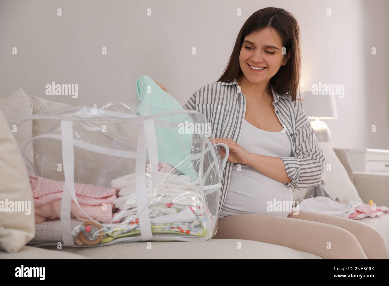 Pregnant packing bag hi-res stock photography and images - Alamy