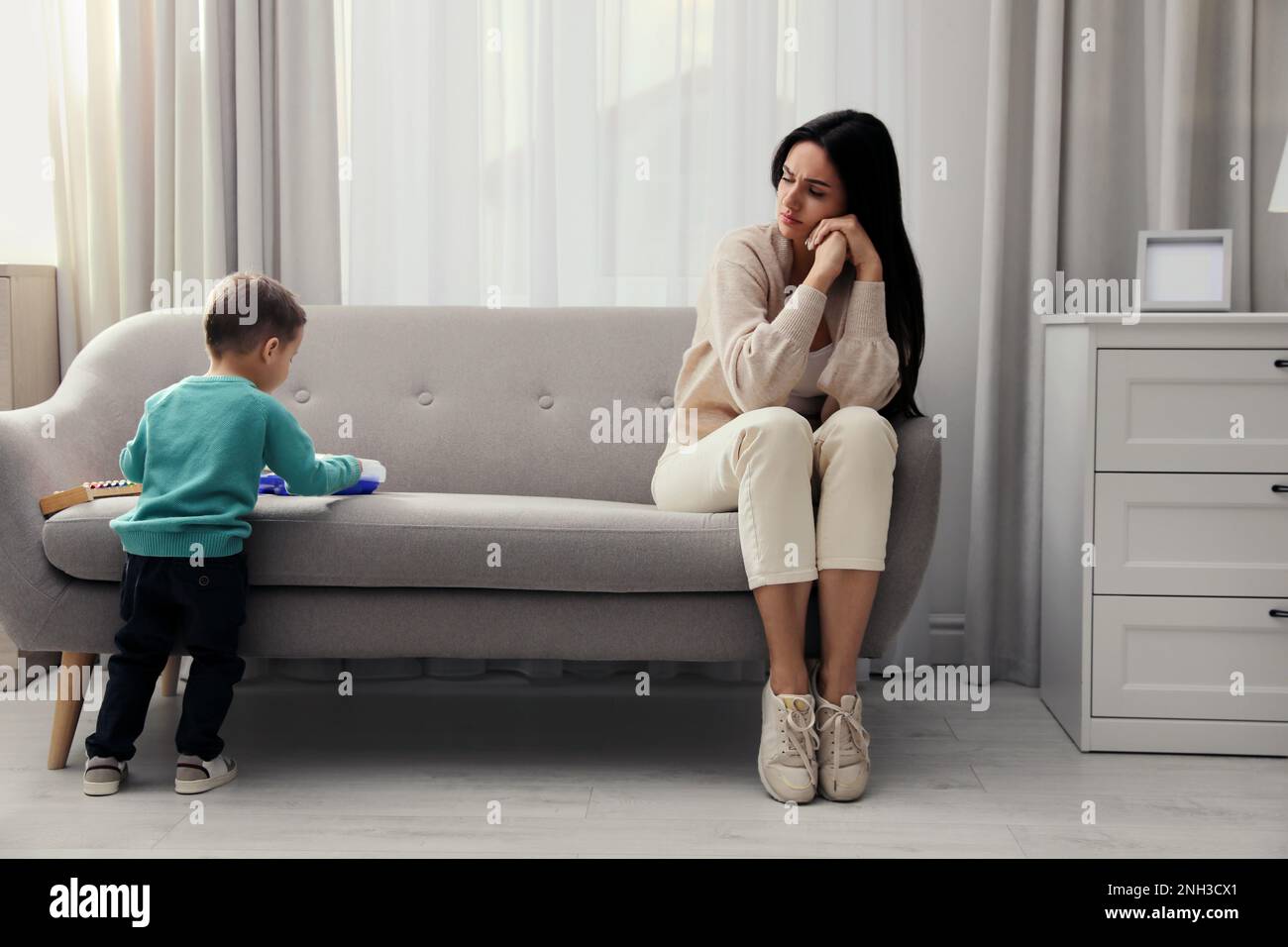 Boy depressed mother hi-res stock photography and images - Alamy