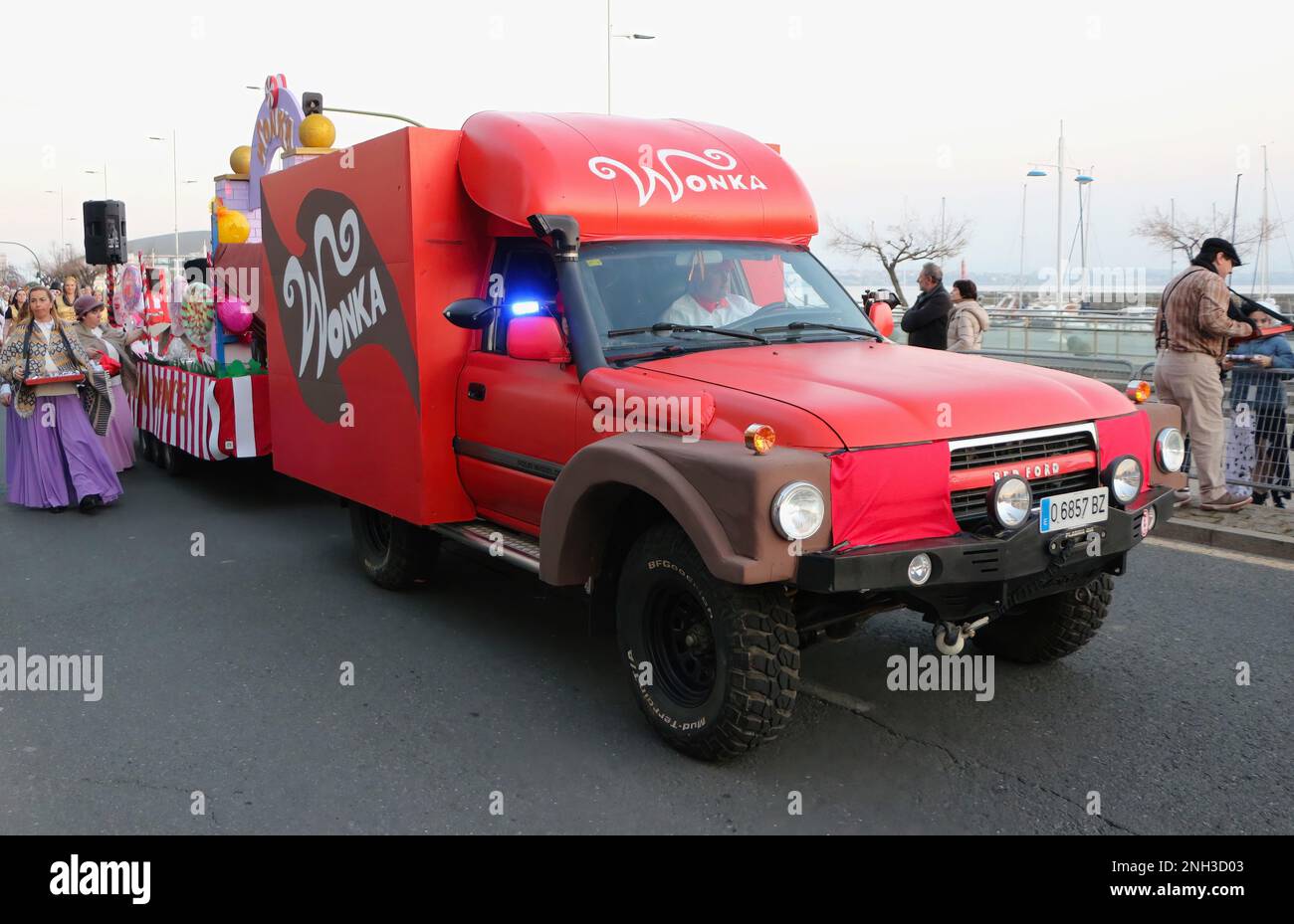 Evening carnival parade with a Willy Wonka themed float in the Spanish ...
