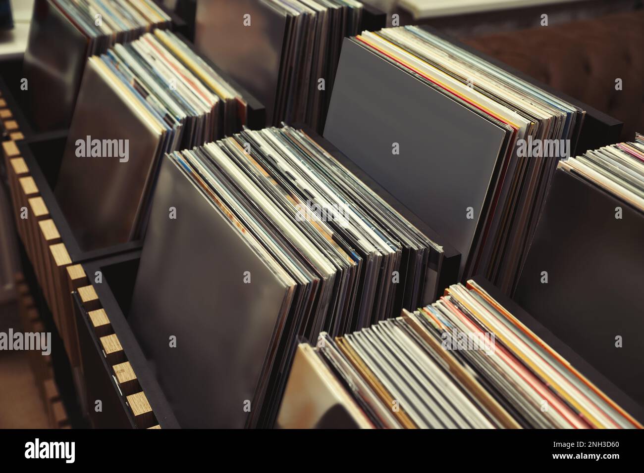 Rack with different vinyl records in store Stock Photo - Alamy