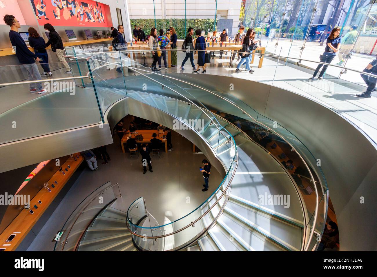 Interior of the Apple store in Omotesando, Tokyo. Center spiral ...