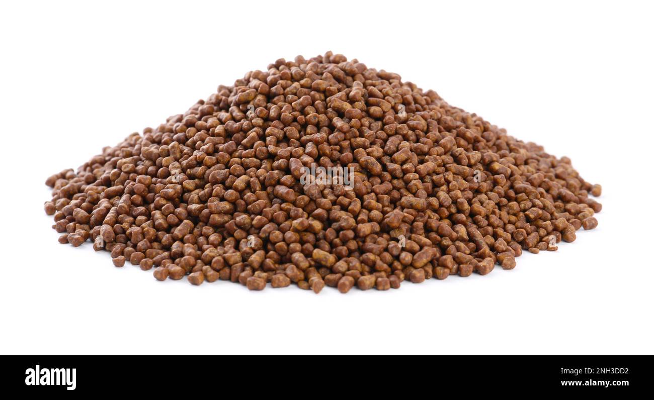 Pile of buckwheat tea granules on white background Stock Photo - Alamy