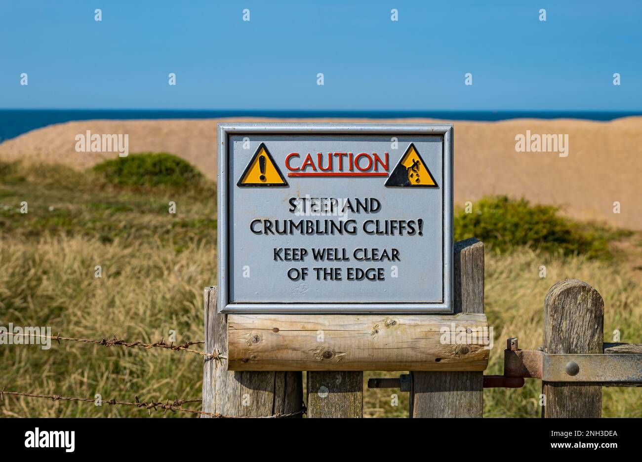 Danger of rockfall on cliffs on coastal path, Jurassic Coast, Dorset ...