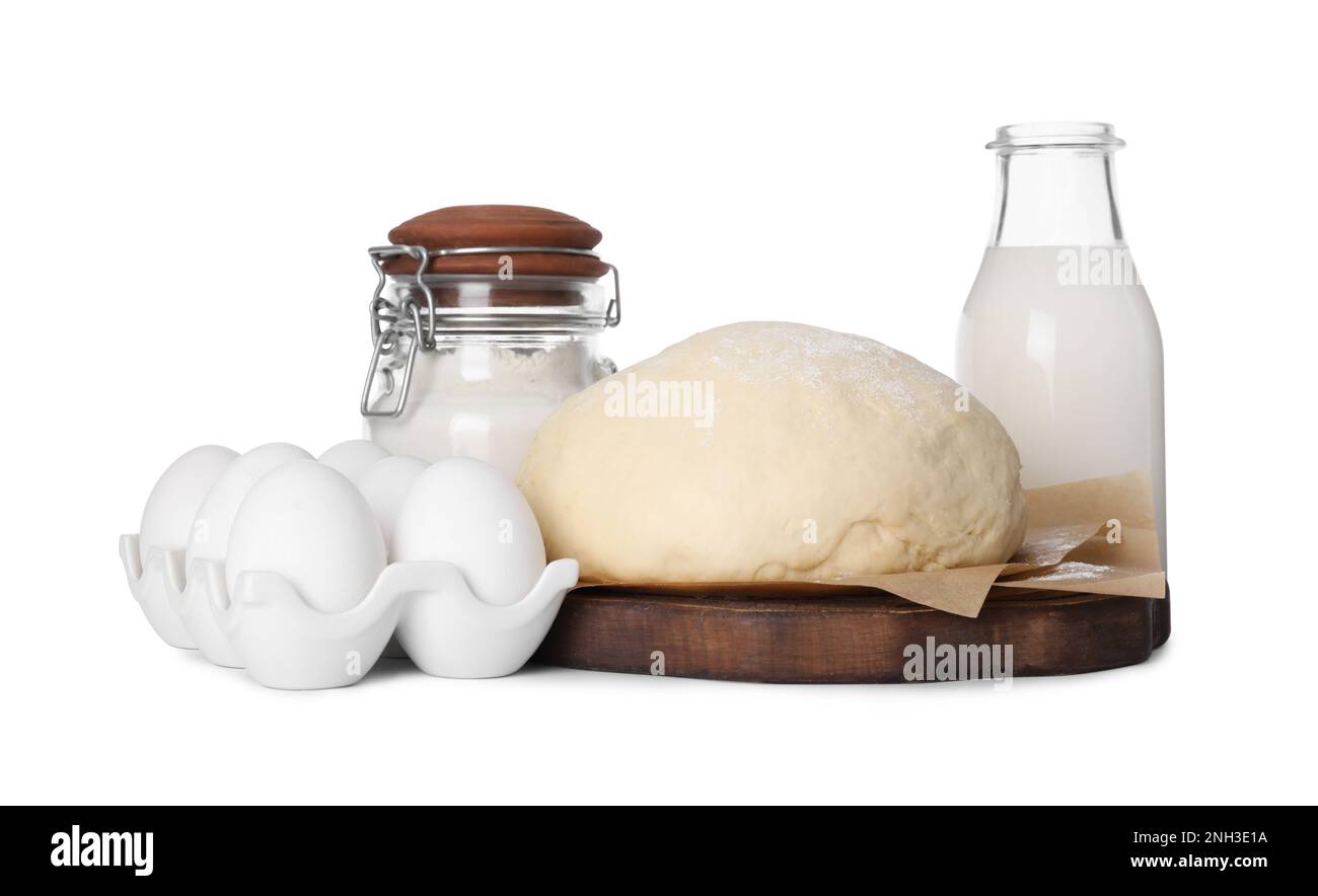 Natural ingredients and raw dough on white background Stock Photo - Alamy