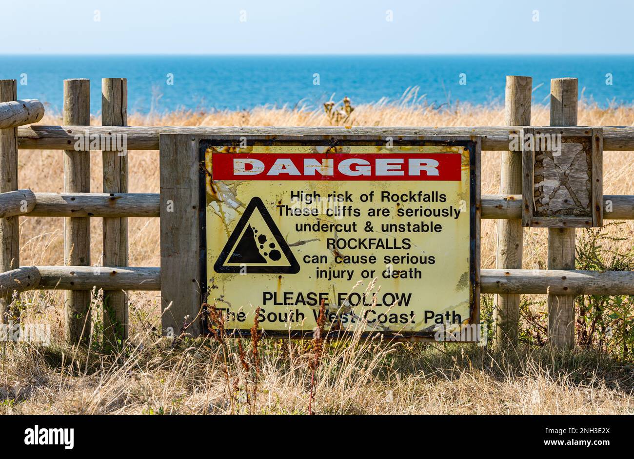 Danger of rockfall on clifftop coastal path, Jurassic Coast, Dorset ...