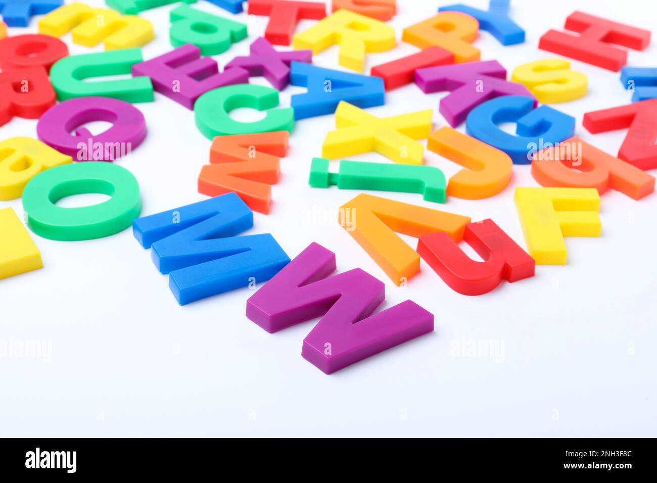 Magnetic letters on white hi-res stock photography and images - Alamy