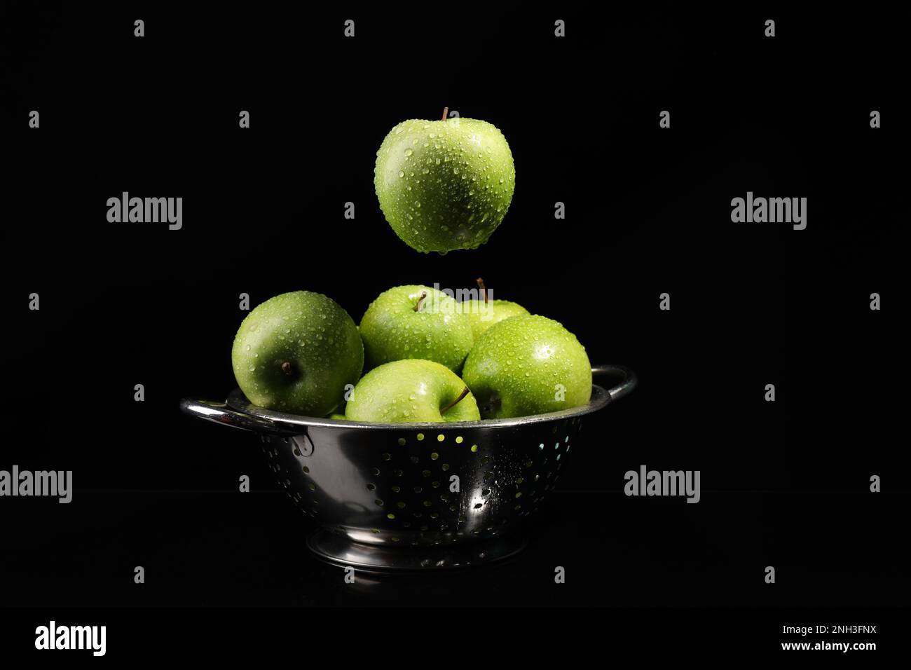 Ripe green apples falling down hi-res stock photography and images - Alamy