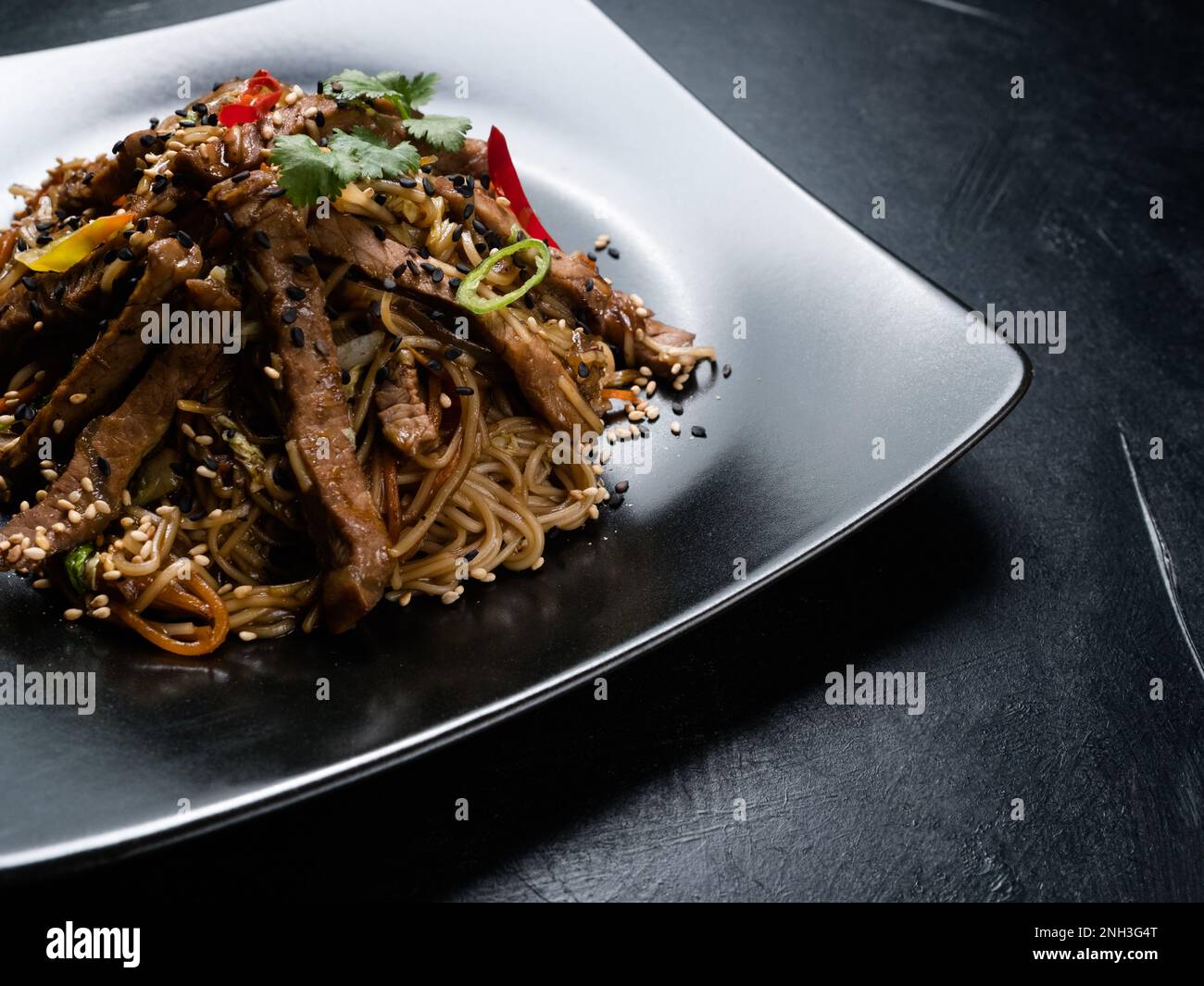 asian restaurant food menu noodle beef meat Stock Photo - Alamy