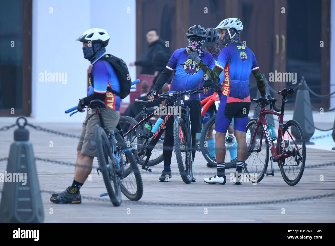 People Cycling early morning workout at corniche on Qatar Notional ...