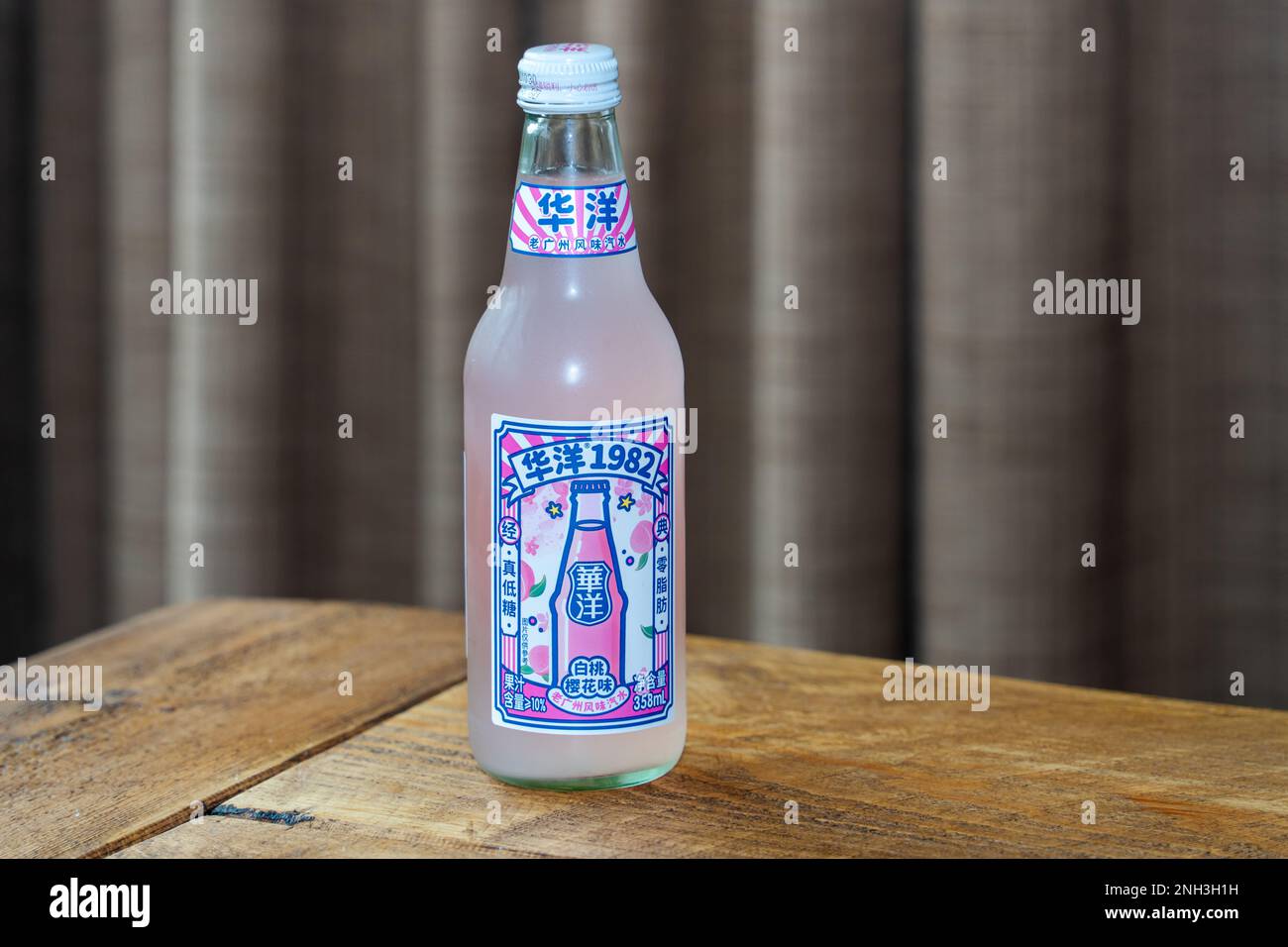 A bottle of 'Magnificent Ocean' 1982 brand low sugar Chinese fizzy ...