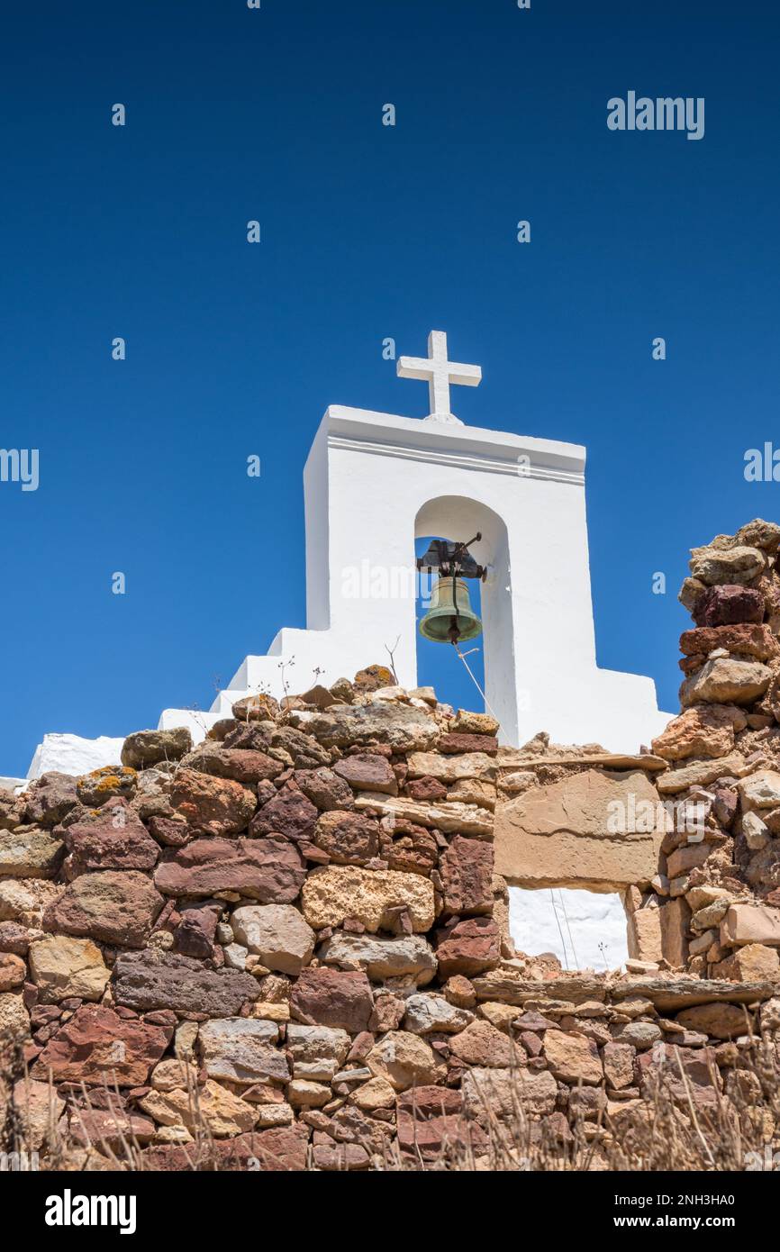 Whitewashed bell tower among the Venetian castle of Chorio ruins ...