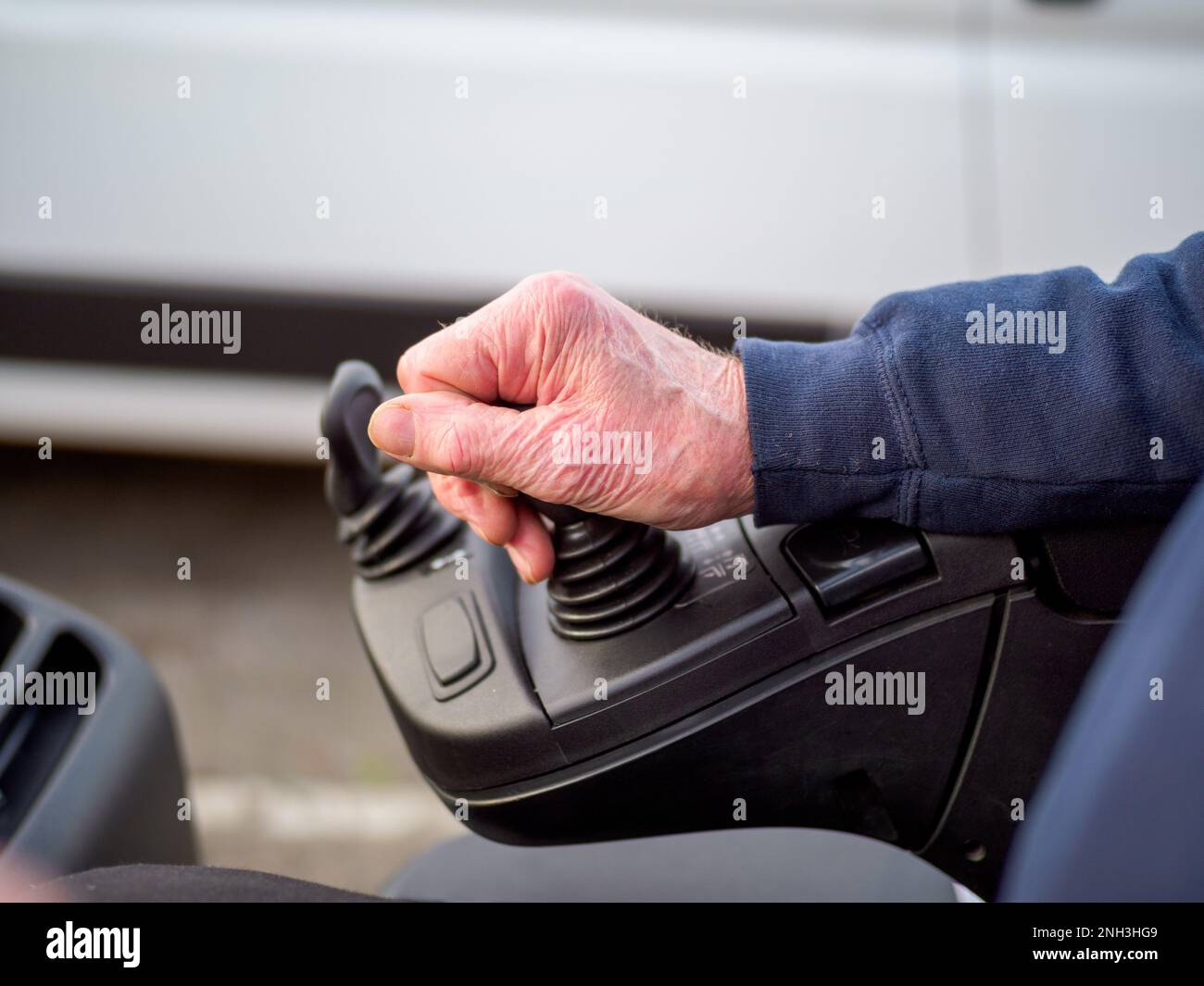 Warehouse worker electric hydraulic forklift hi-res stock photography ...