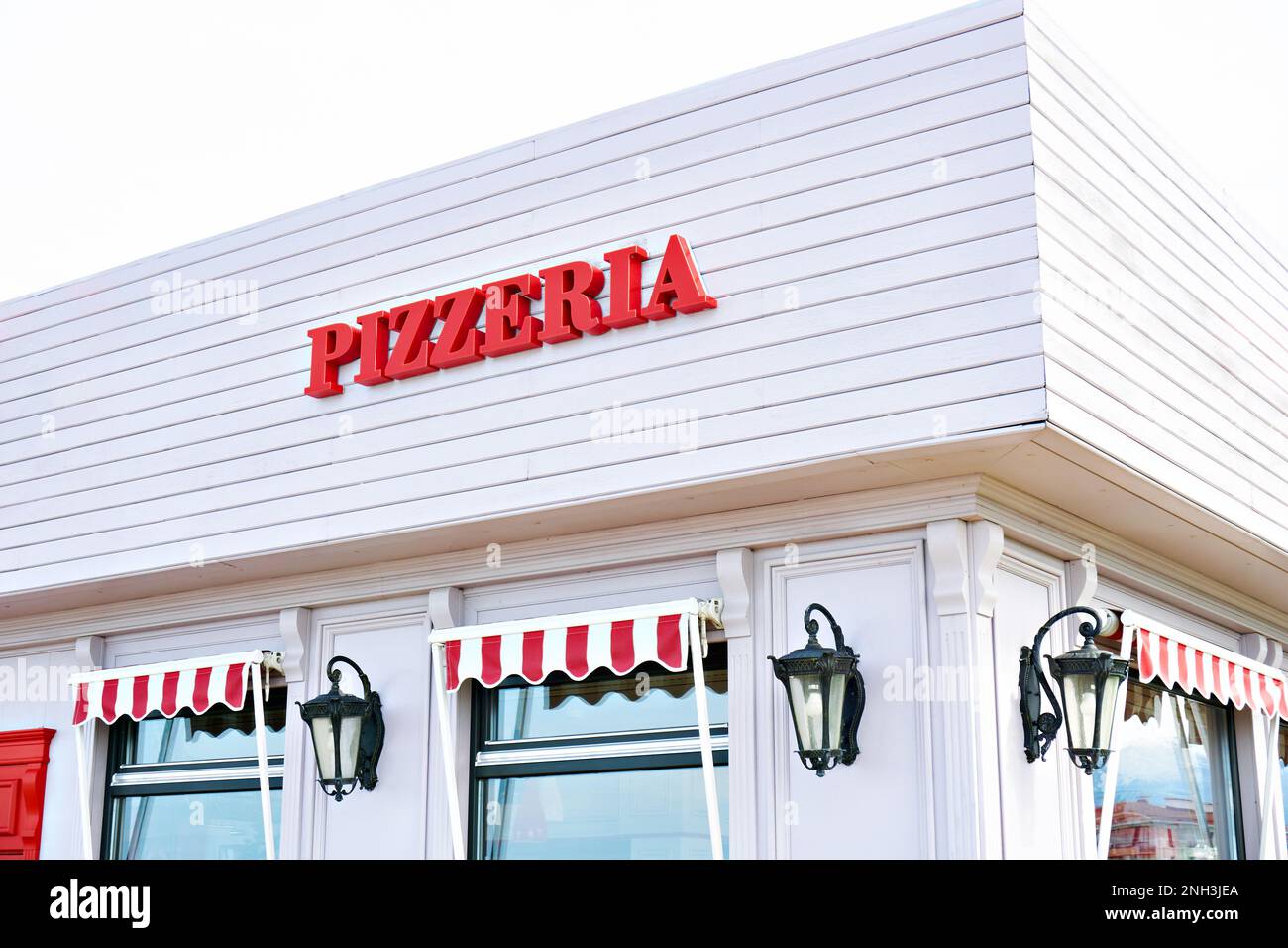 Sign Pizzeria on the facade of the cafe Stock Photo - Alamy