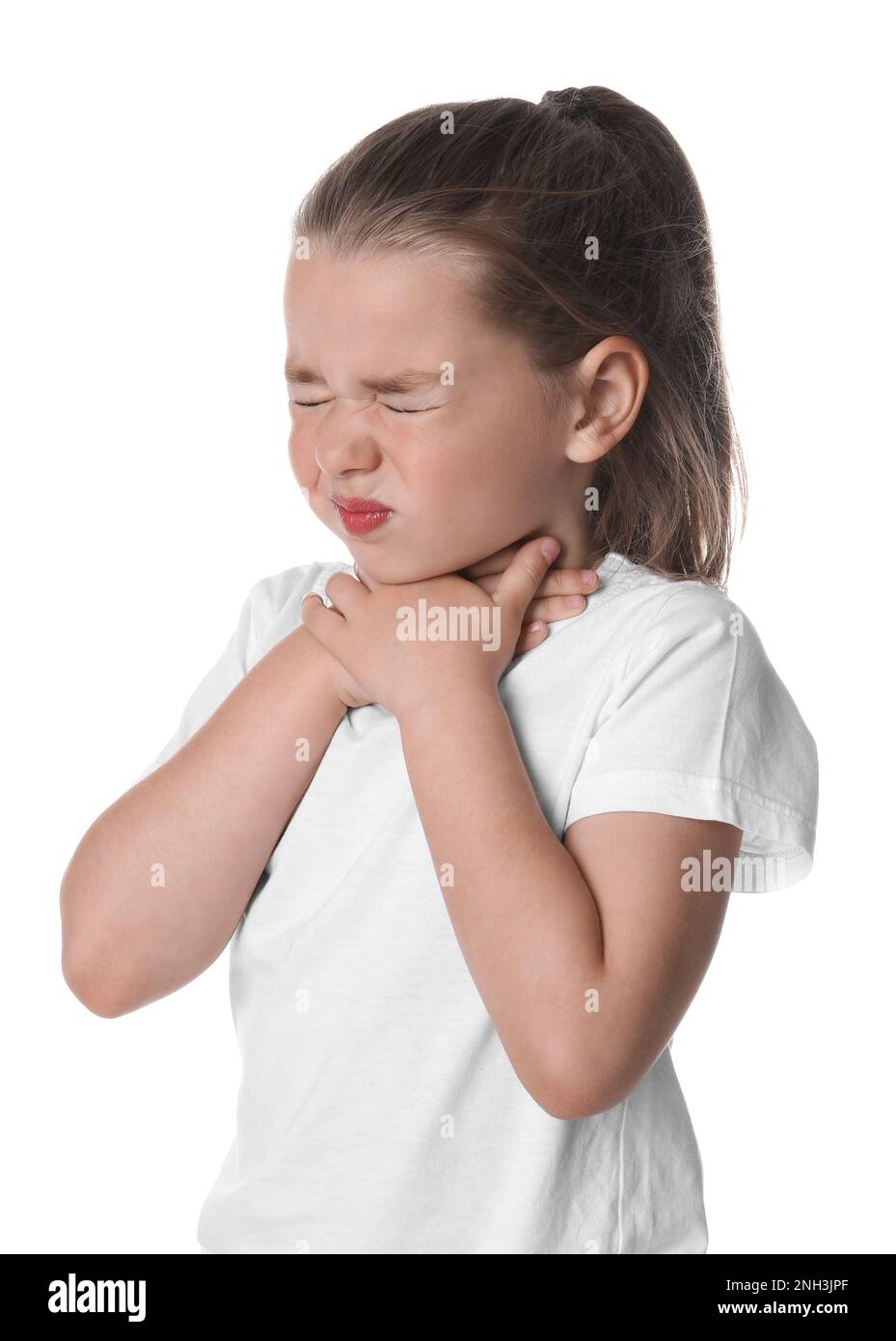 Little girl suffering from sore throat on white background Stock Photo ...
