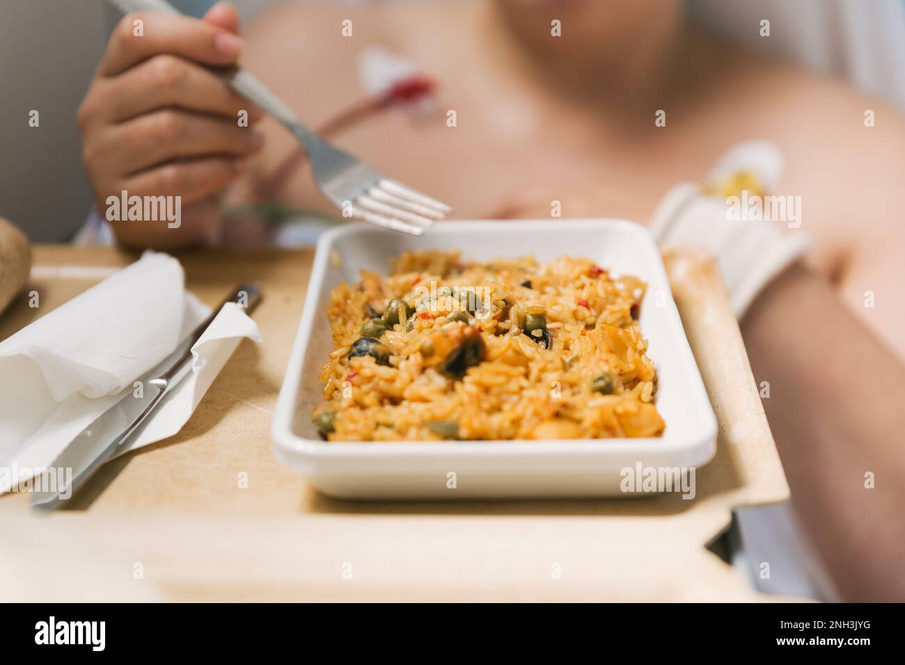 Female patient eating food in the hospital room Stock Photo - Alamy