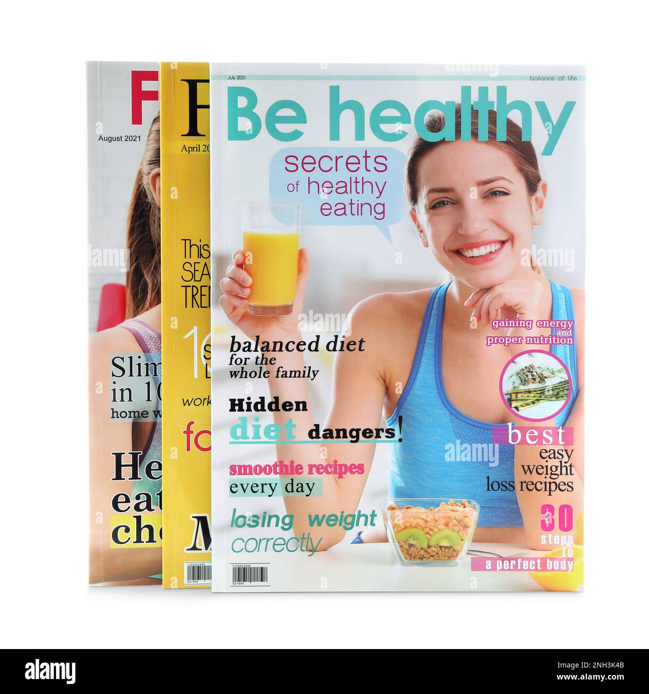 Different modern printed magazines on white background Stock Photo - Alamy