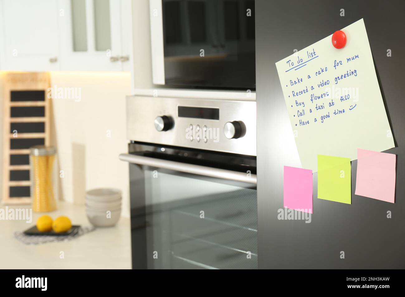To do list and sticky notes on fridge in kitchen. Space for text Stock ...