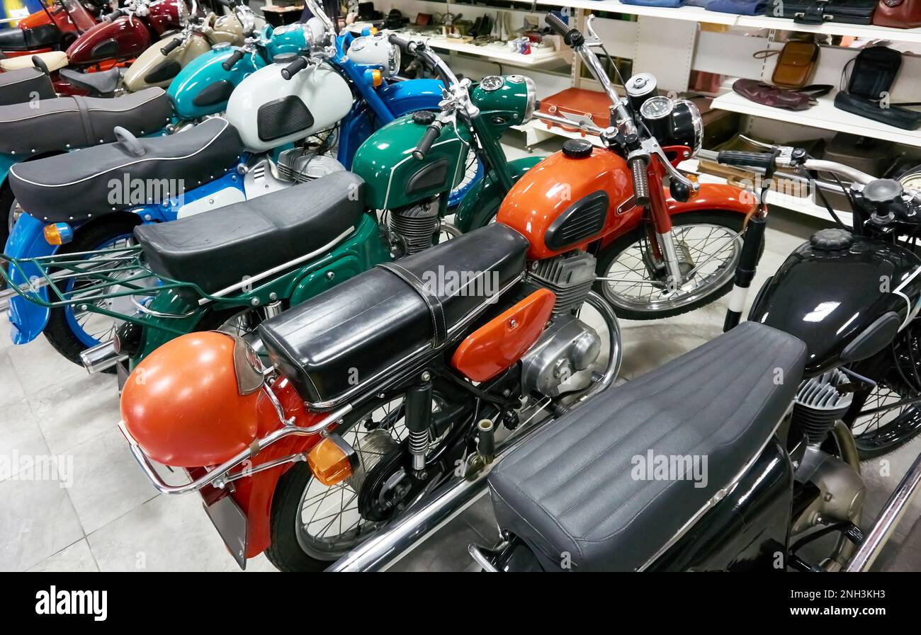 Retro motorcycles in the store Stock Photo - Alamy