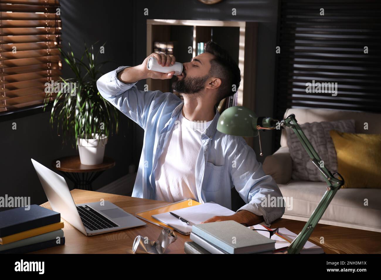 College student drinking energy drink hi-res stock photography and ...