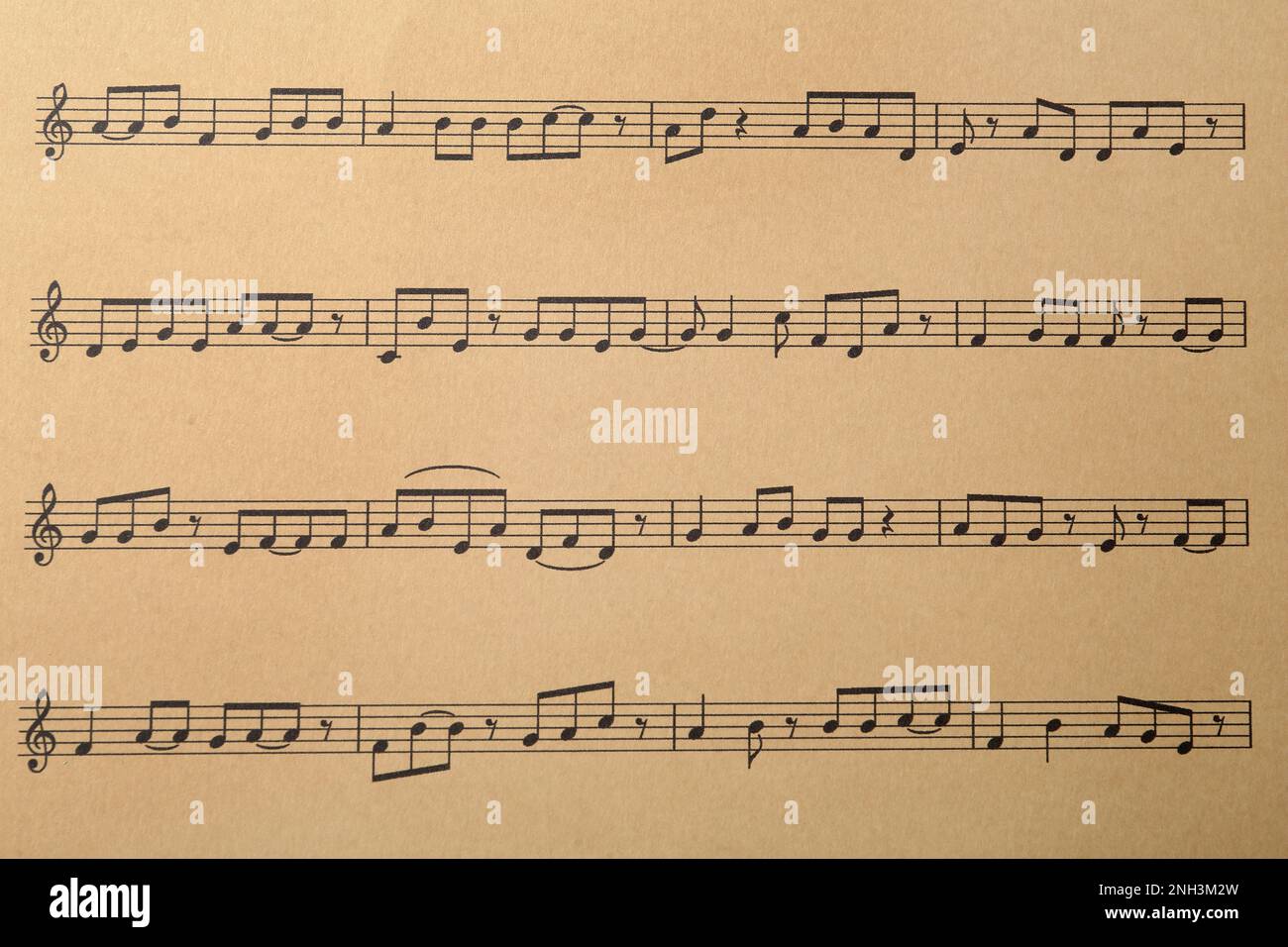 Paper sheet with musical notes, closeup view Stock Photo - Alamy