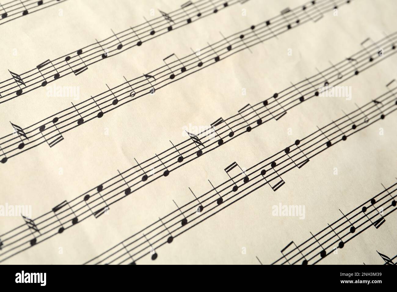 Paper sheet with musical notes, closeup view Stock Photo - Alamy
