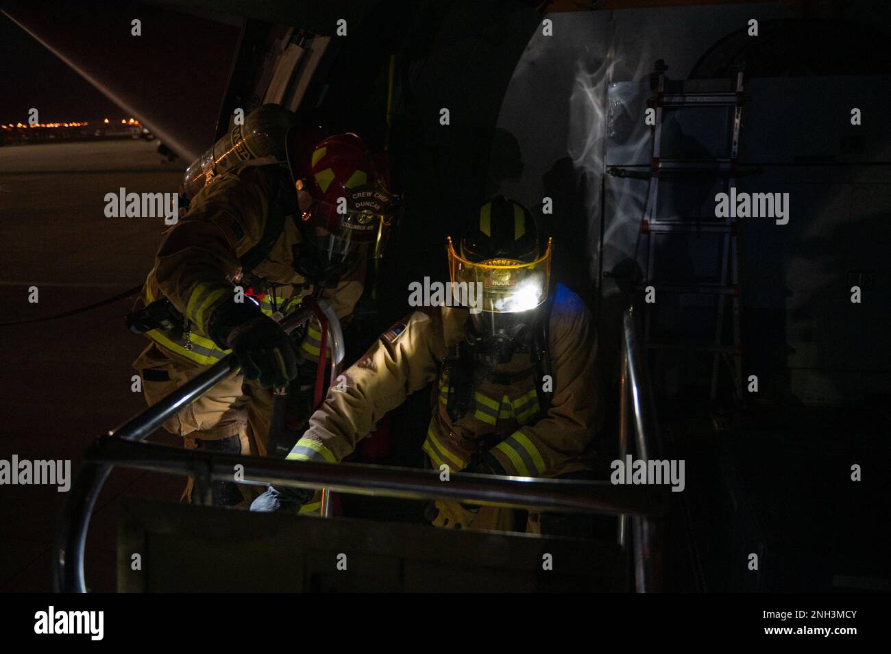 U.S. Air Force Tech. Sgt. Kyle Duncan and Senior Airman Edmond Hook ...
