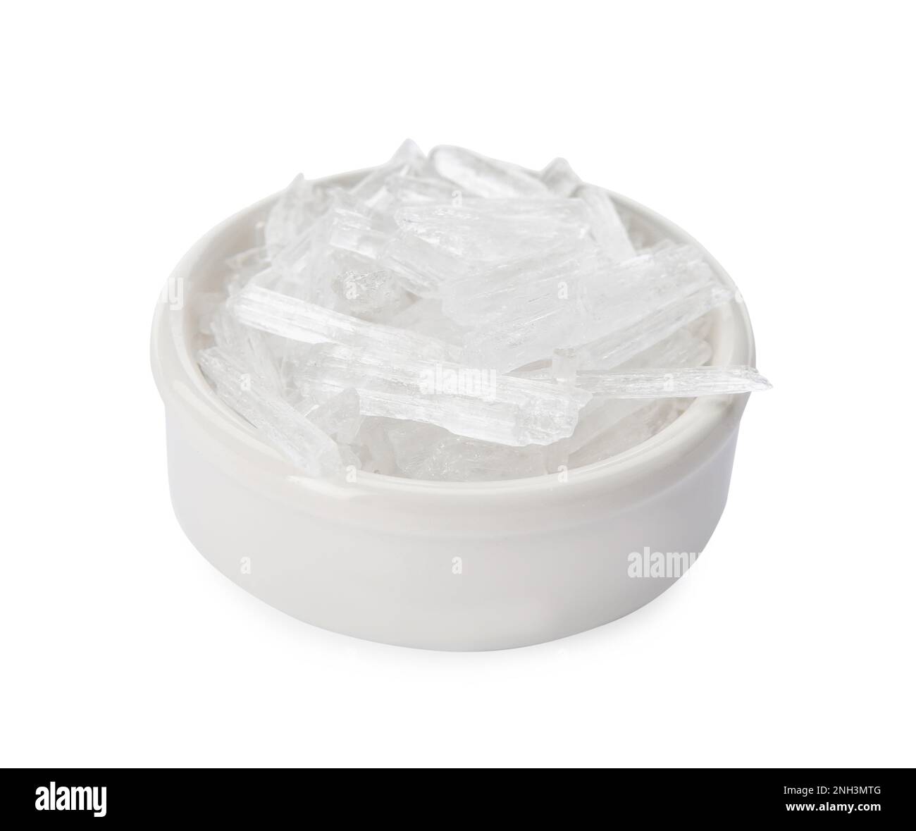 Menthol crystals in bowl on white background Stock Photo - Alamy