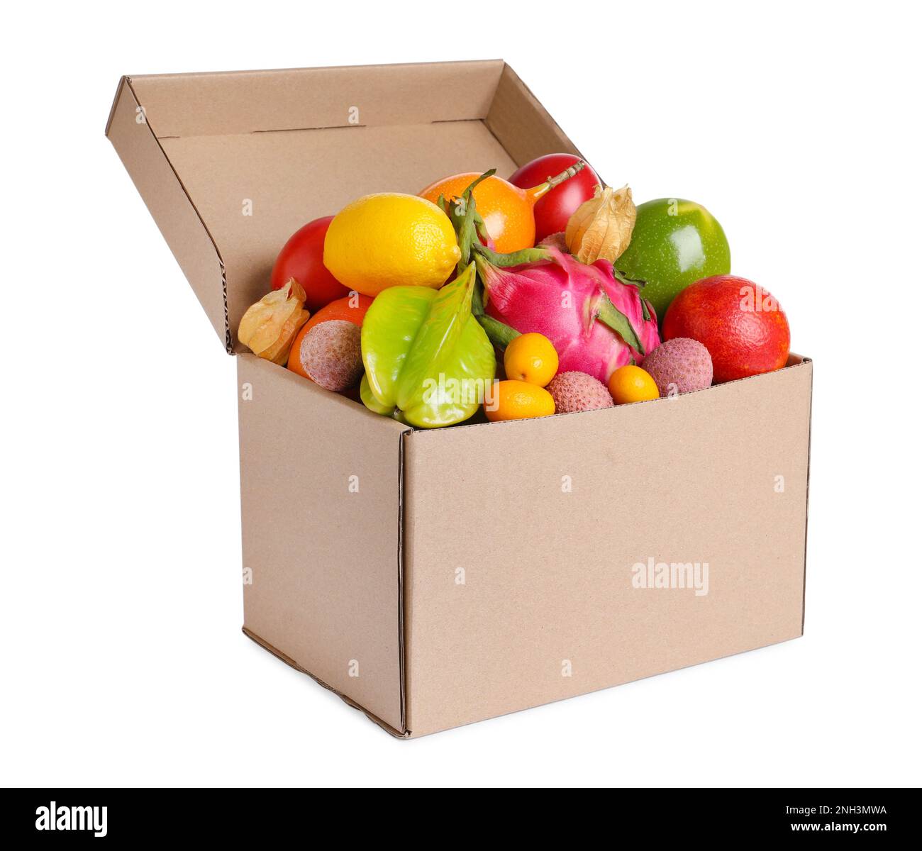 Cardboard box with different exotic fruits on white background Stock ...