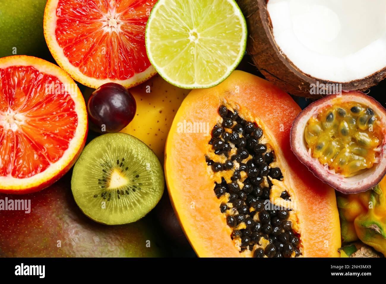 Many different delicious exotic fruits as background, closeup Stock ...