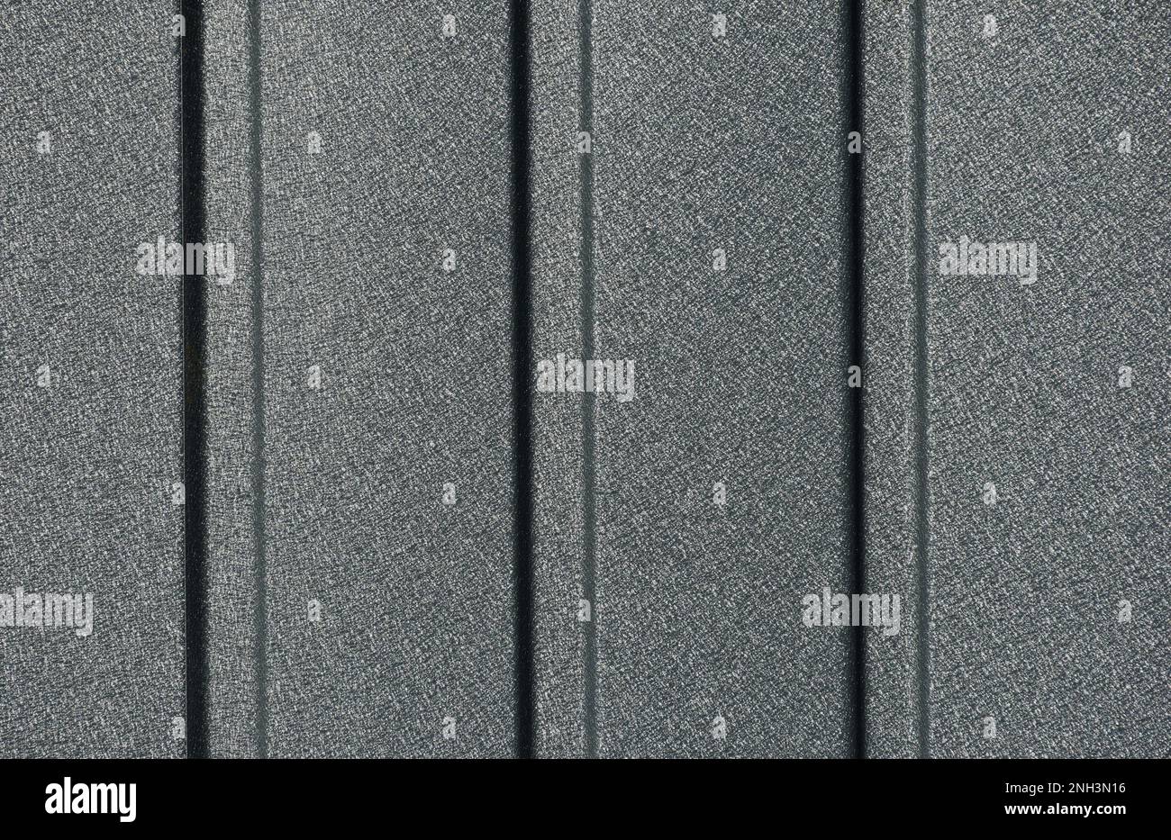powder coated textured gray metal siding macro detail with heads ...