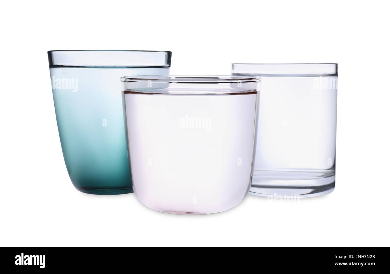 Different glasses of water on white background Stock Photo - Alamy