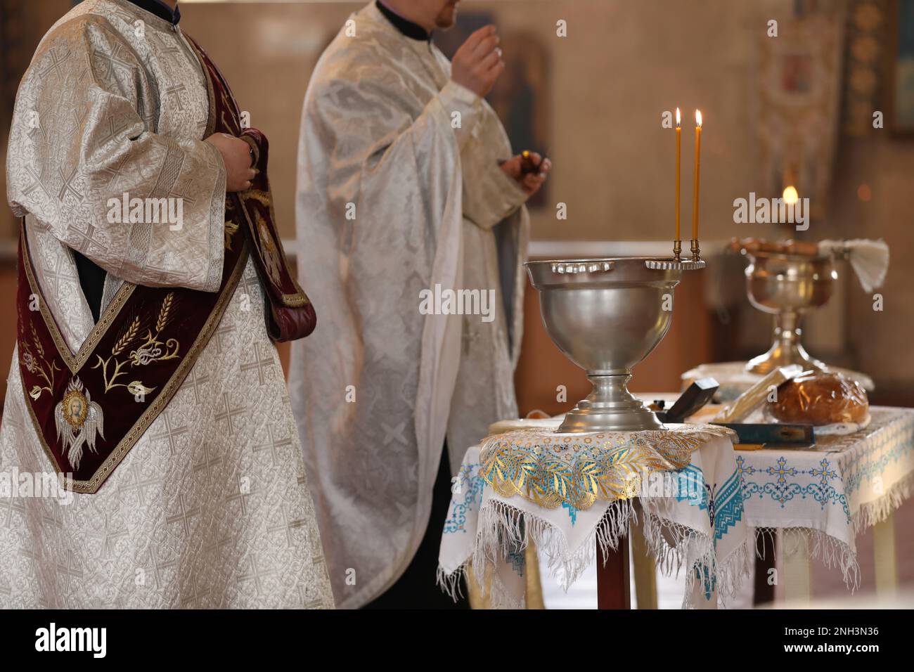 MYKOLAIV, UKRAINE - FEBRUARY 27, 2021: Deacon and priest conducting ...