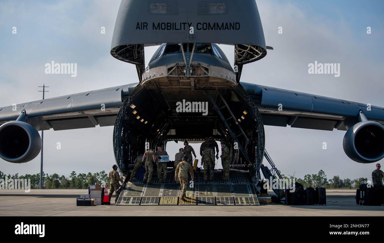 U.S. Airmen assigned to Dover Air Force Base, Delaware, arrive at ...