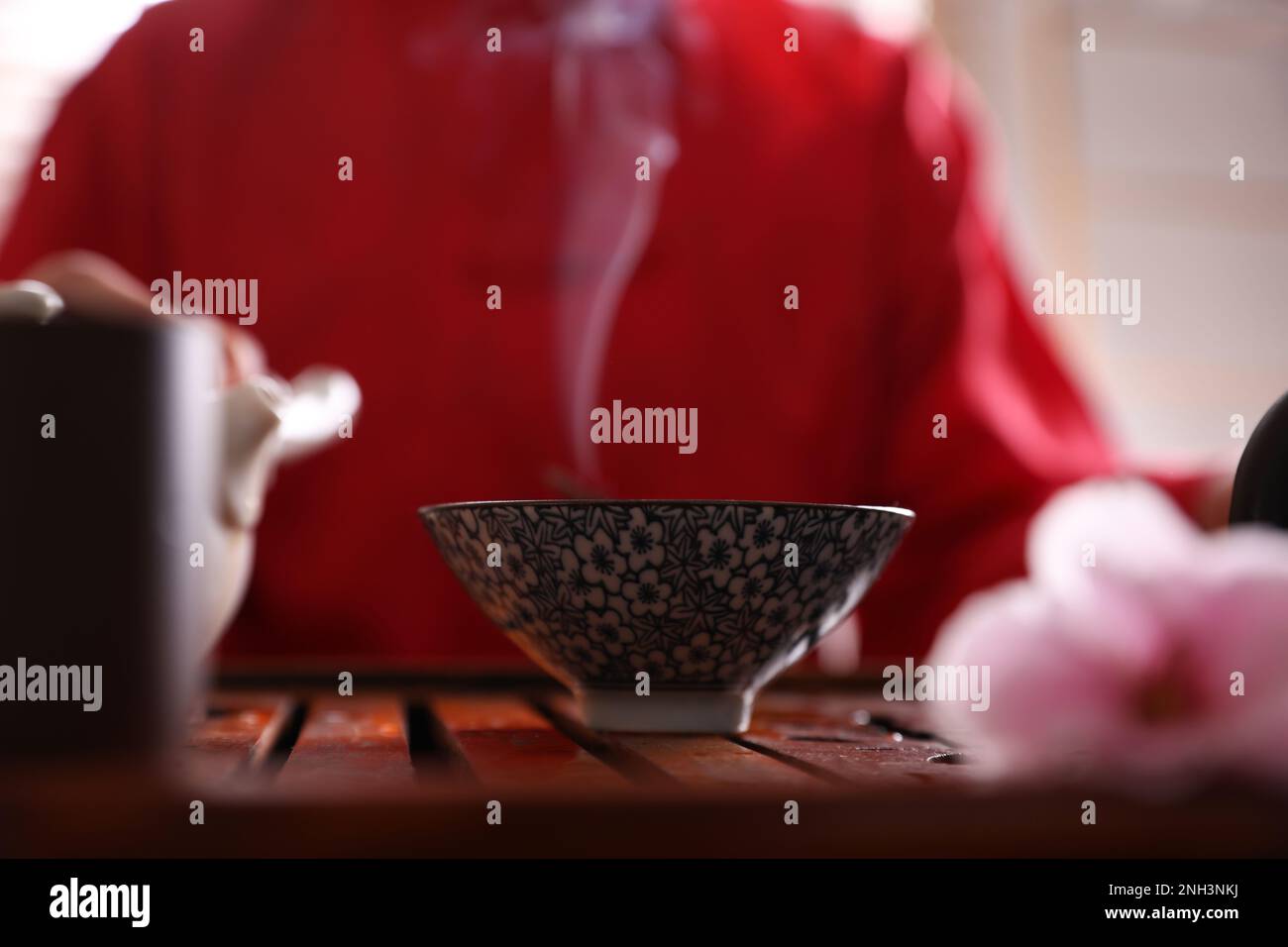 Steam raising above cup on tray. Traditional tea ceremony Stock Photo ...
