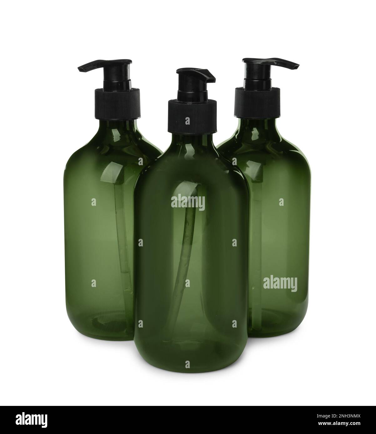 Reusable green plastic dispensers on white background Stock Photo - Alamy