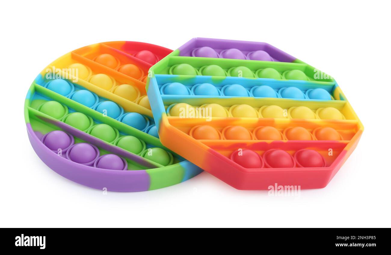 Rainbow pop it fidget toys on white background Stock Photo - Alamy