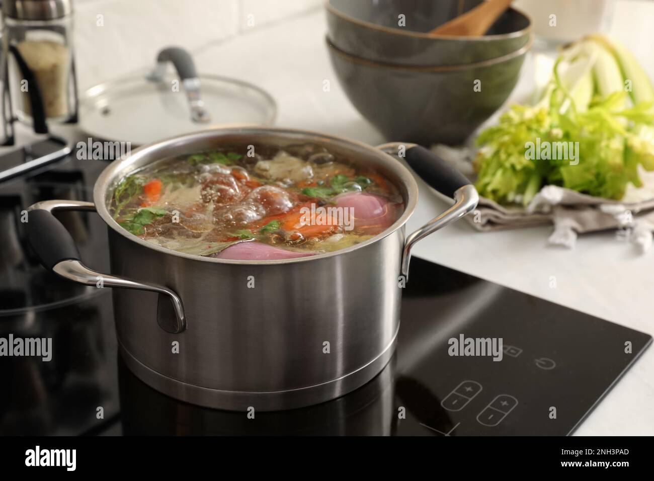 Vegetable stock boiling in pot hi-res stock photography and images - Alamy