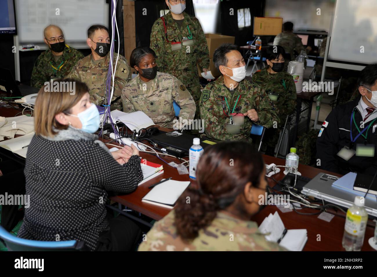 U. S. Army Judge Advocate General (JAG) Officers attend a briefing with ...