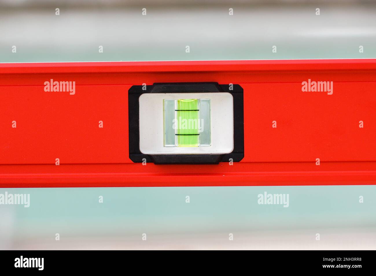 Red spirit level for architectural and construction works Stock Photo ...