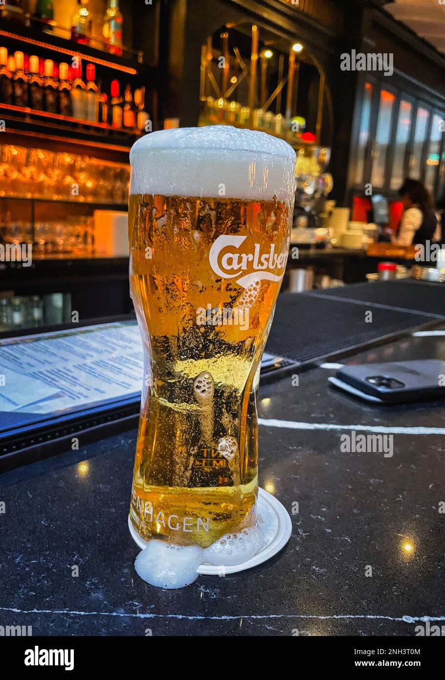 An ice cold pint of Carlserg Pilsner in an Irish pub Stock Photo - Alamy
