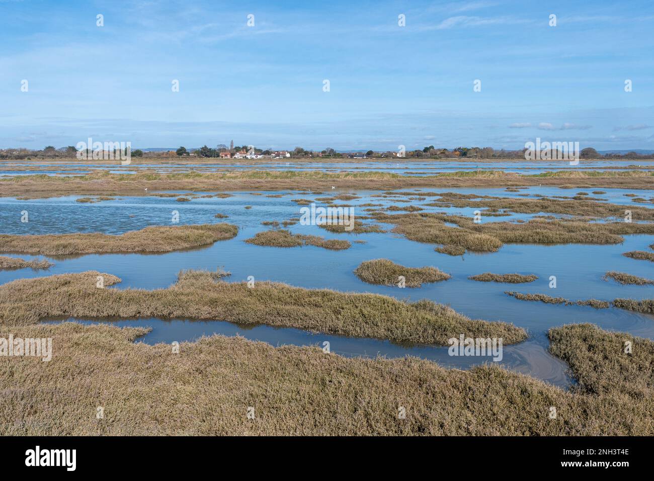 View of Pagham Harbour RSPB Local Nature Reserve on a sunny winter day ...