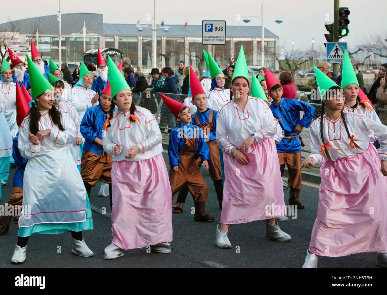 Evening carnival parade with dancing group of girls in the Spanish ...