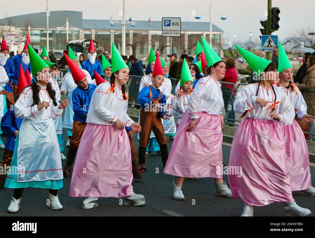 Evening carnival parade with dancing group of girls in the Spanish ...